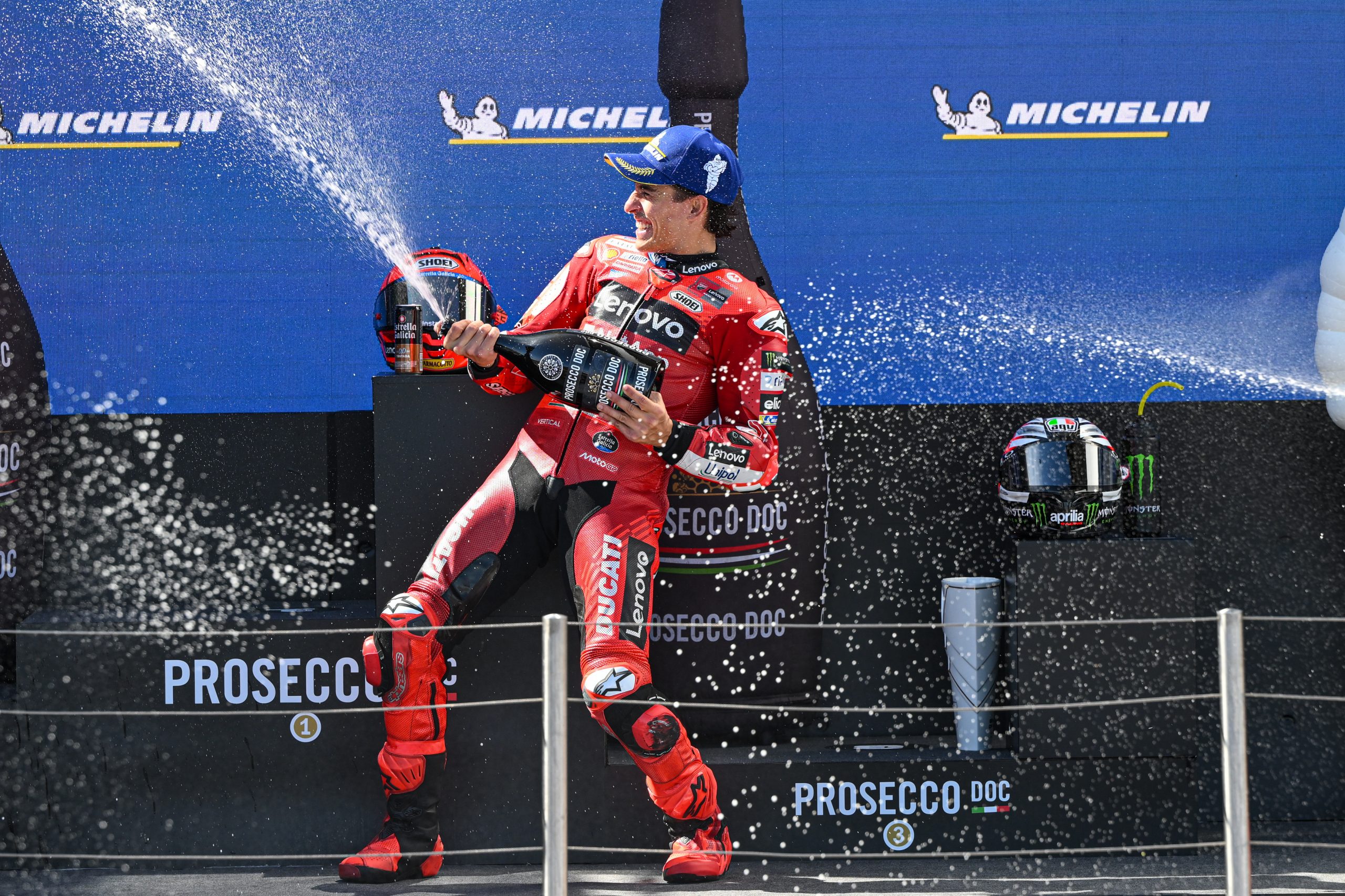 Márquez fends off Acosta and Bezzecchi to keep perfect 2025 run alive ...